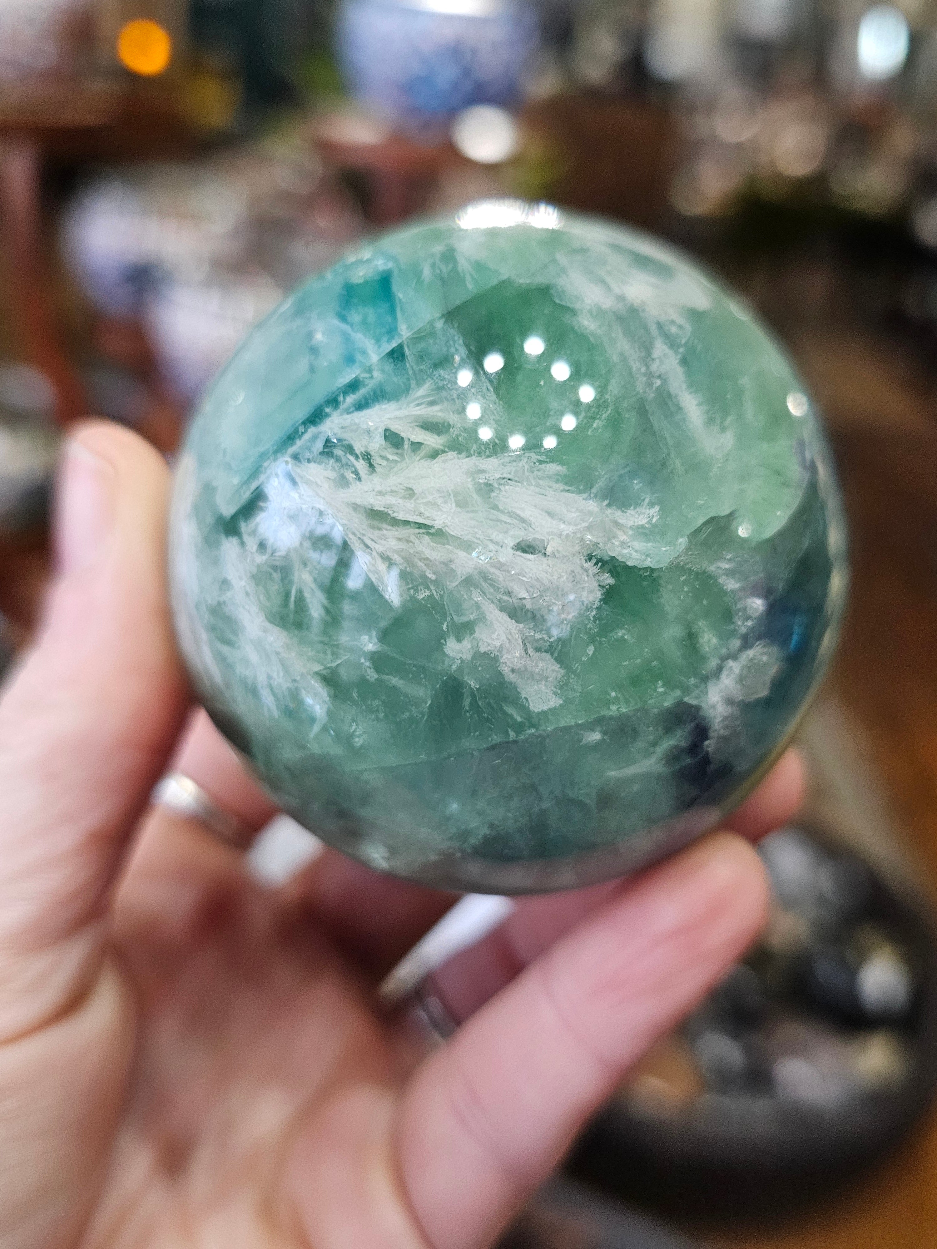Feather Fluorite Sphere – The Crystal Cellar